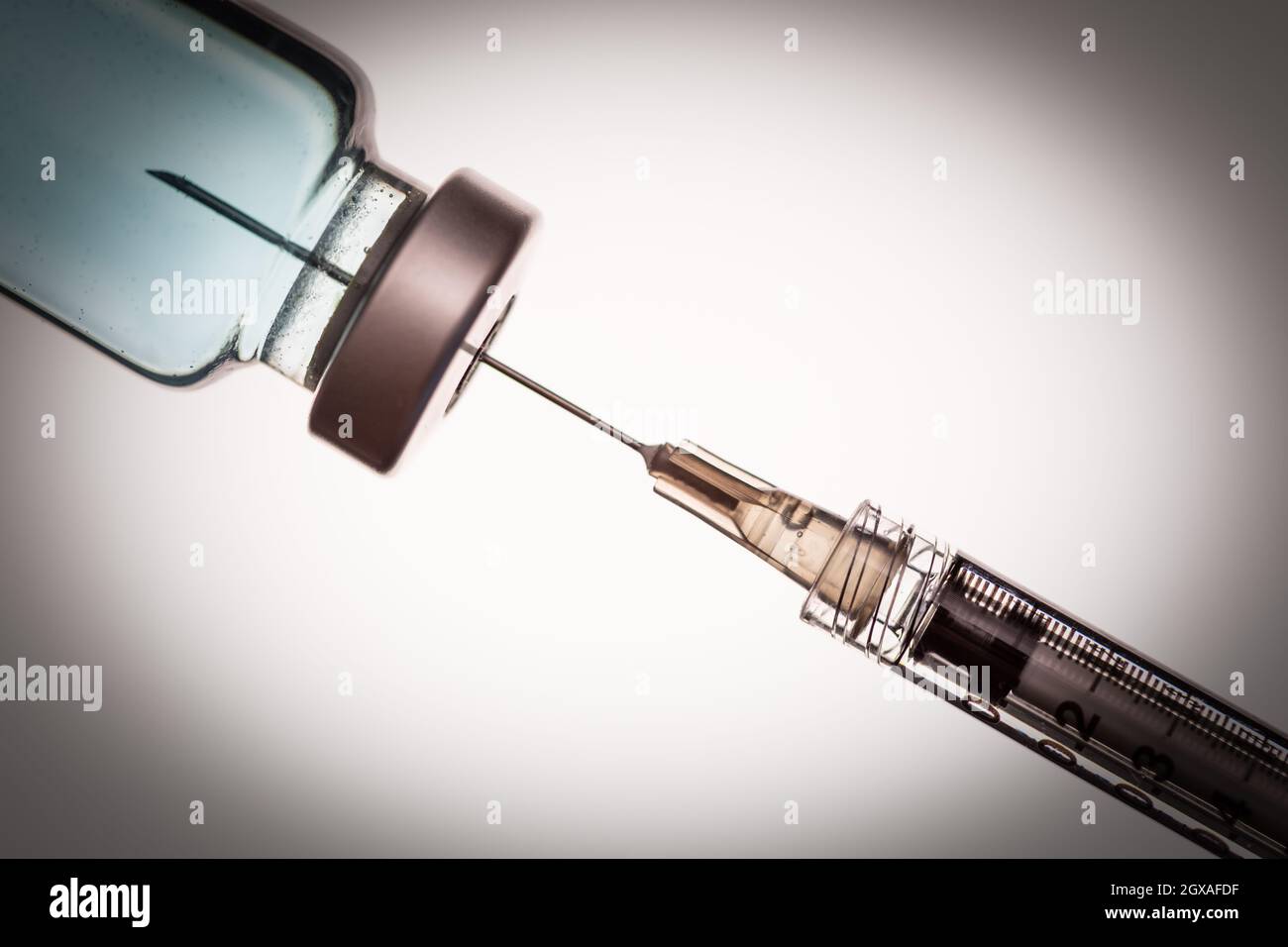 Medical Syringe Needle and Vaccine Vial Against White Background Stock ...