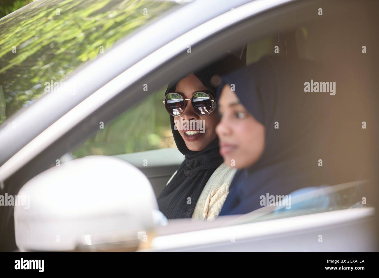 Arabic Woman Couple Traveling By Luxury Car in Saudy Arabia Stock Photo ...