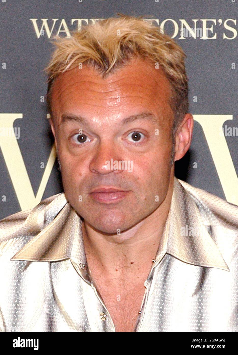 Graham Norton with Brazilian dancing girls at his book launch for his ...