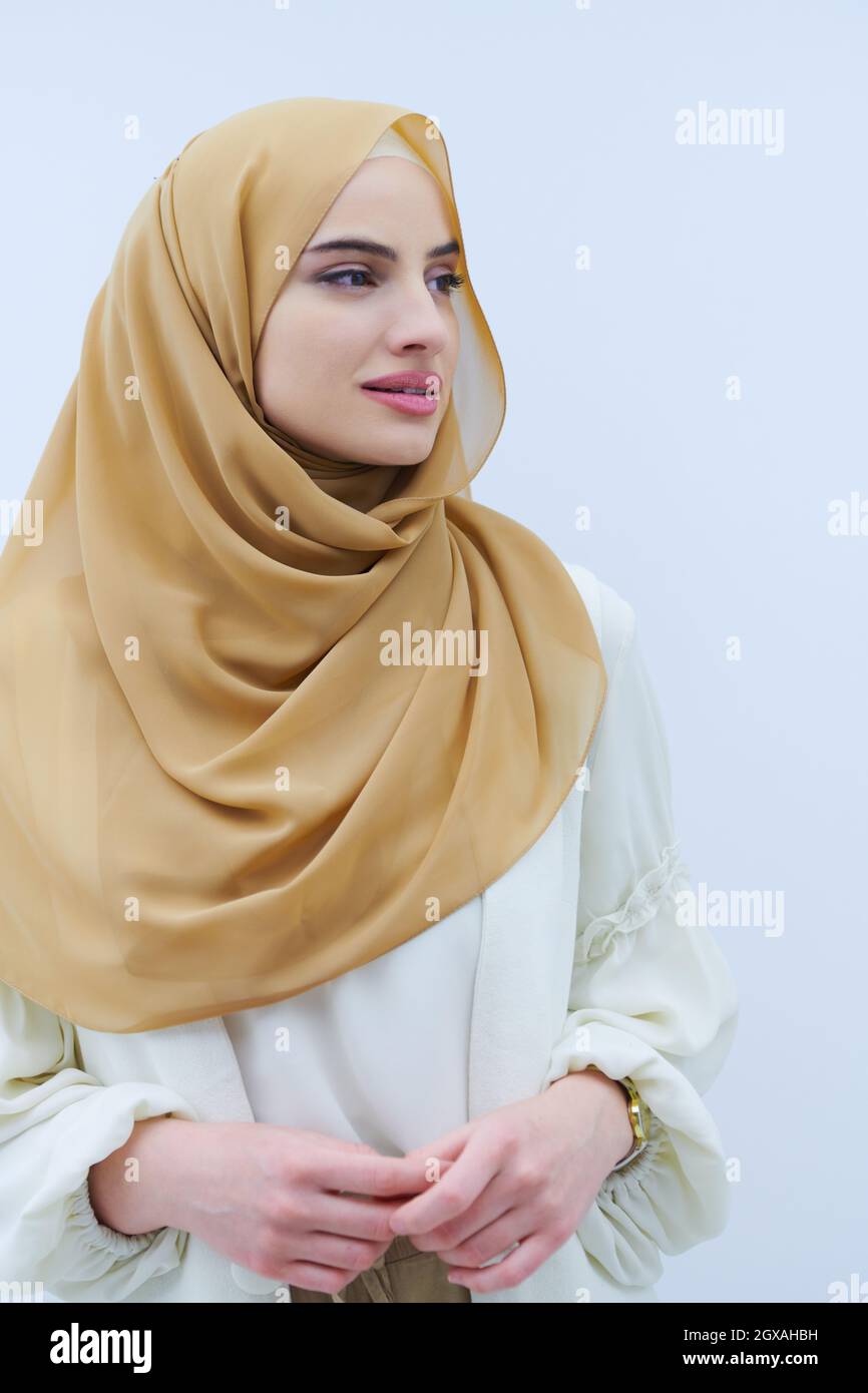portrait of beautiful muslim woman in fashionable dress with hijab ...
