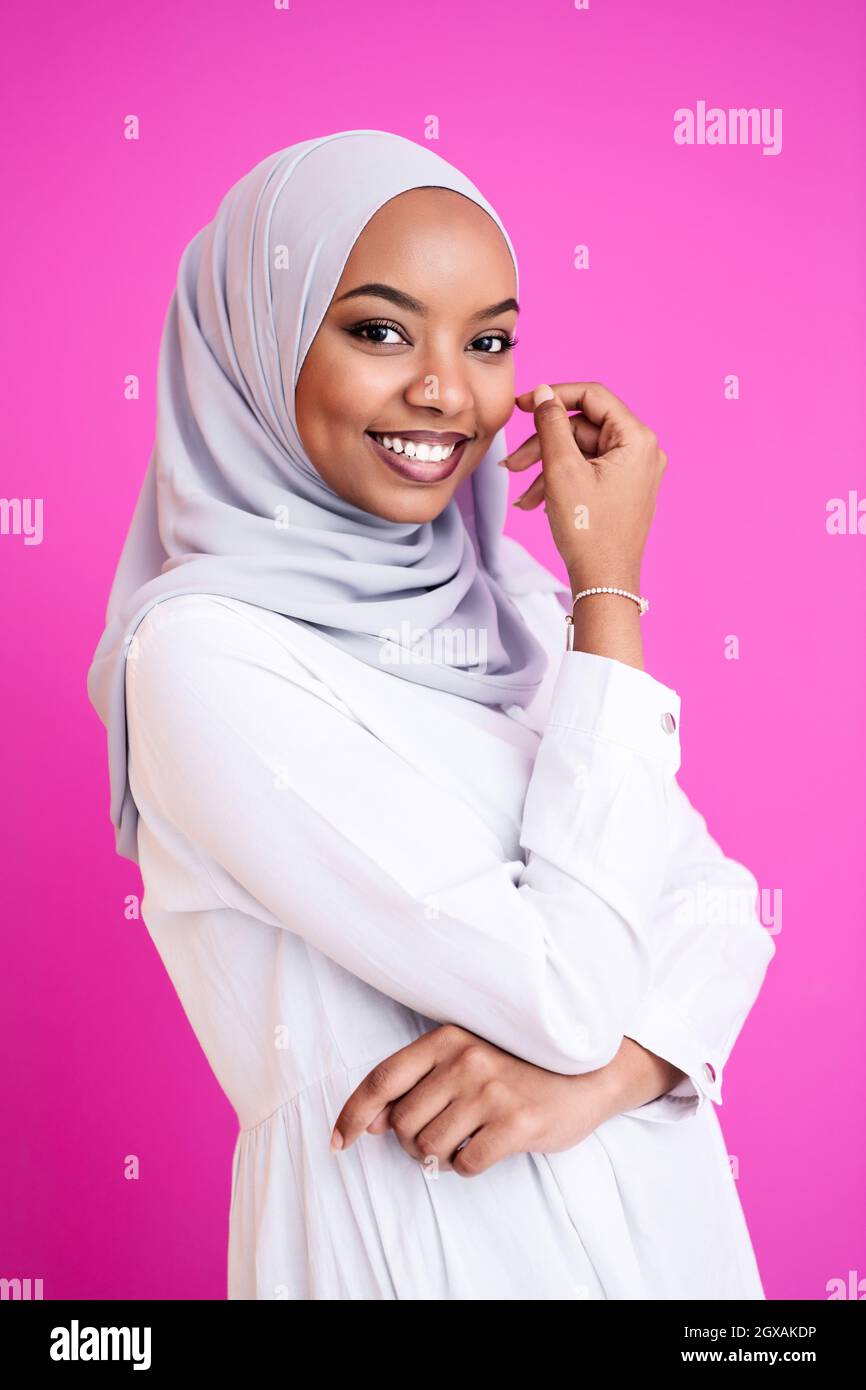portrait of young modern muslim afro beauty wearing traditional islamic ...