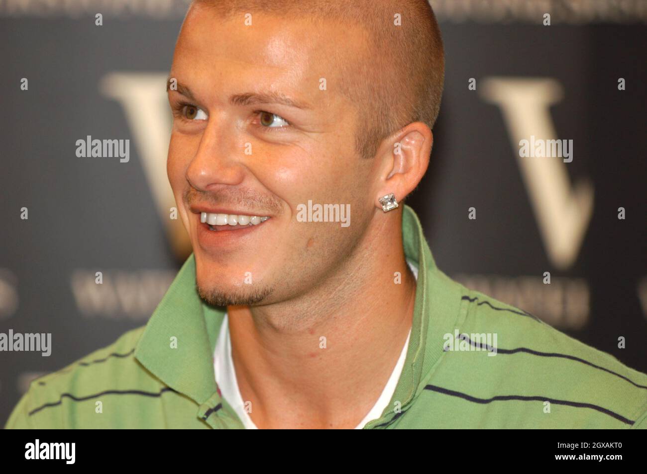 David Beckham singing cpies of his latest autobiography My Side at ...