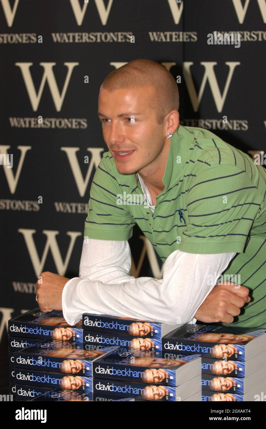 David Beckham singing cpies of his latest autobiography My Side at ...