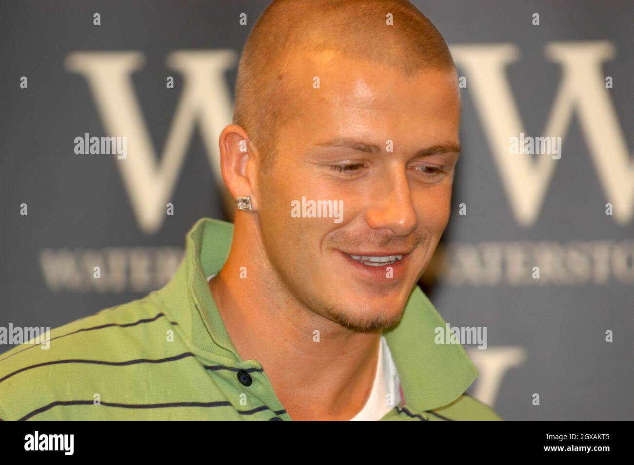 David Beckham singing cpies of his latest autobiography My Side at ...