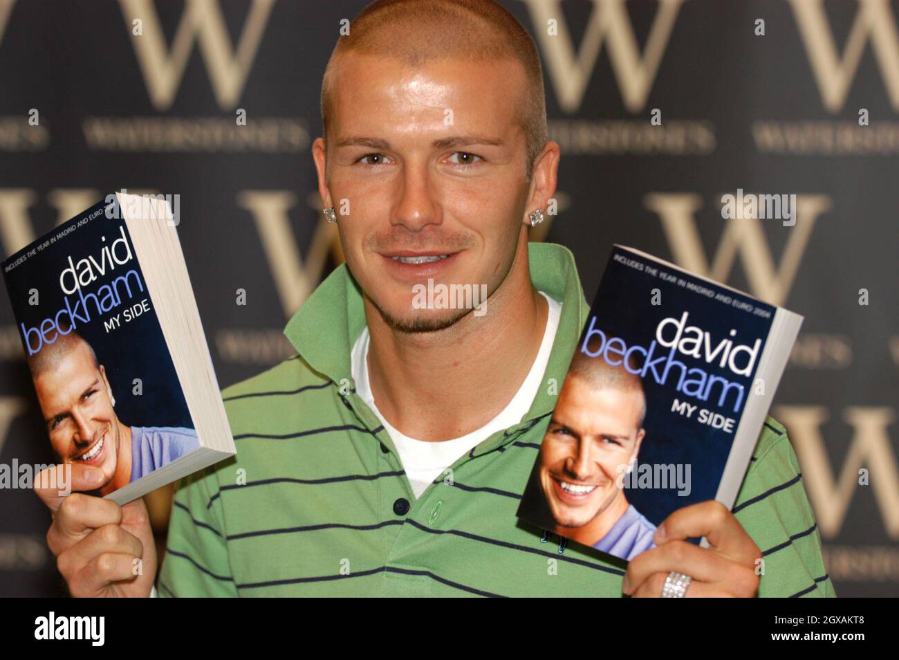 David Beckham singing cpies of his latest autobiography My Side at ...