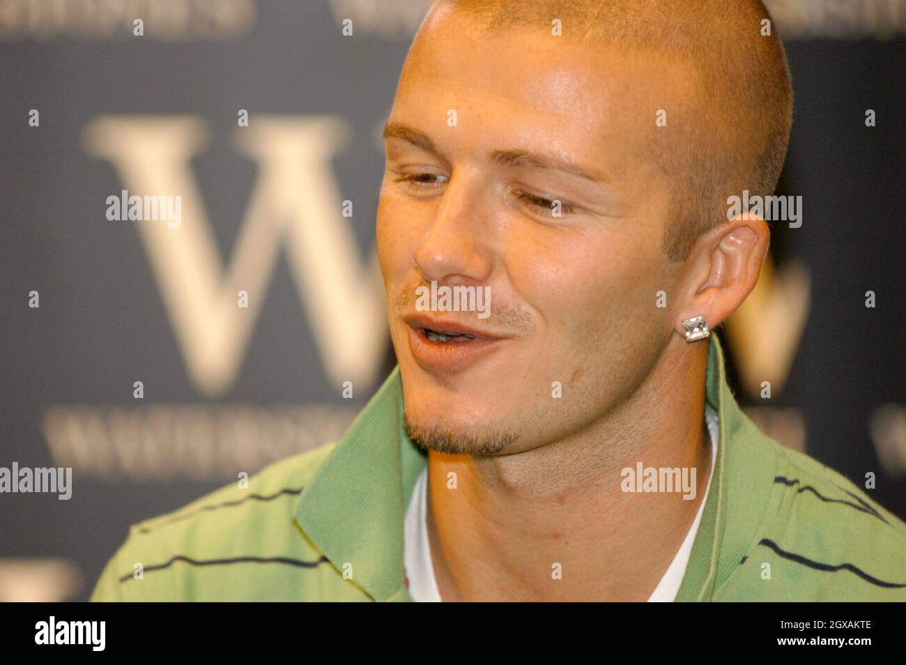 David Beckham singing cpies of his latest autobiography My Side at ...