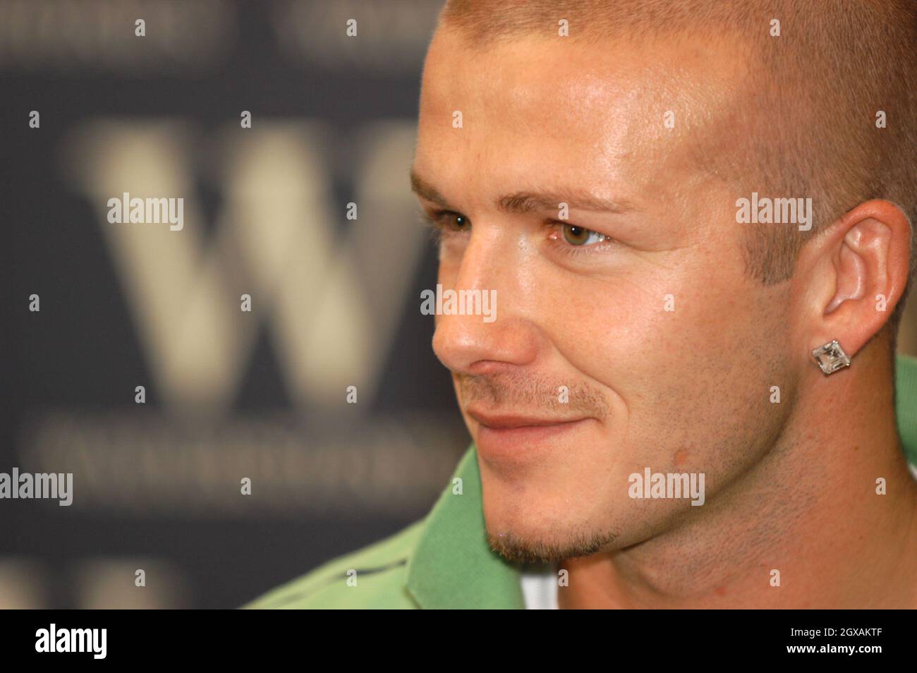 David Beckham singing cpies of his latest autobiography My Side at ...