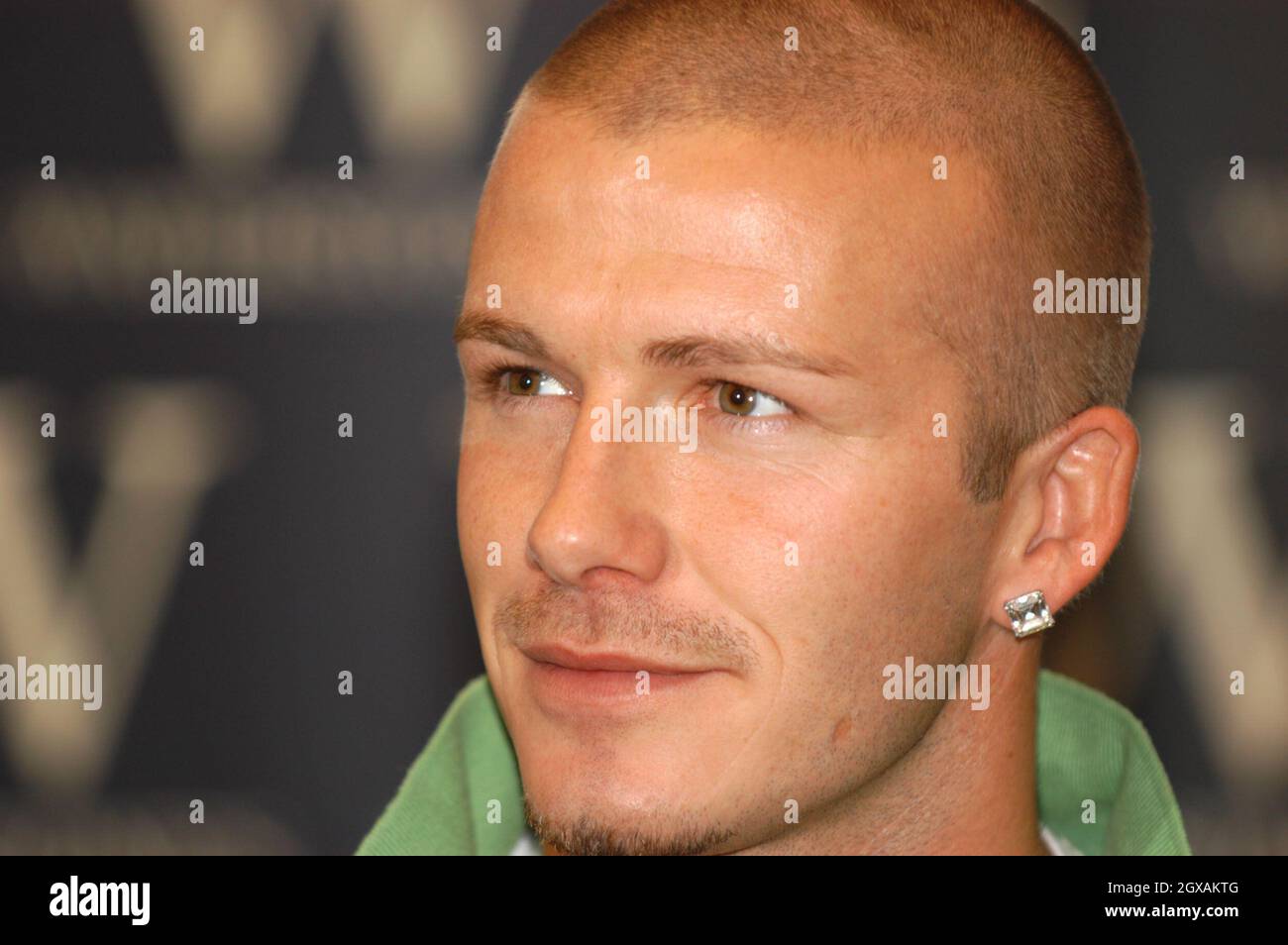 David Beckham singing cpies of his latest autobiography My Side at ...