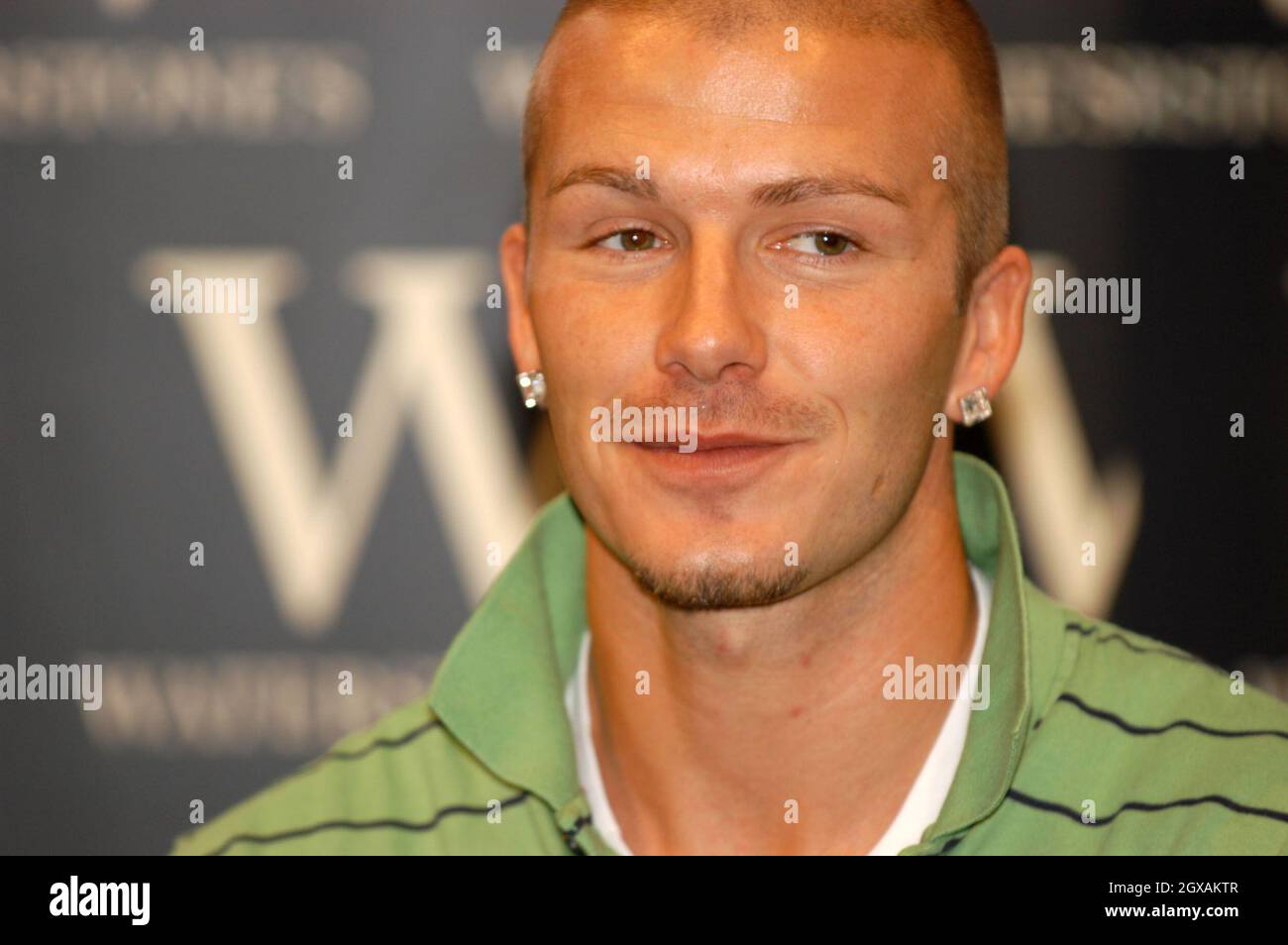 David Beckham singing cpies of his latest autobiography My Side at ...