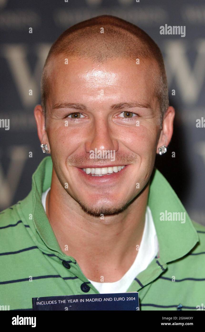 David Beckham singing cpies of his latest autobiography My Side at ...