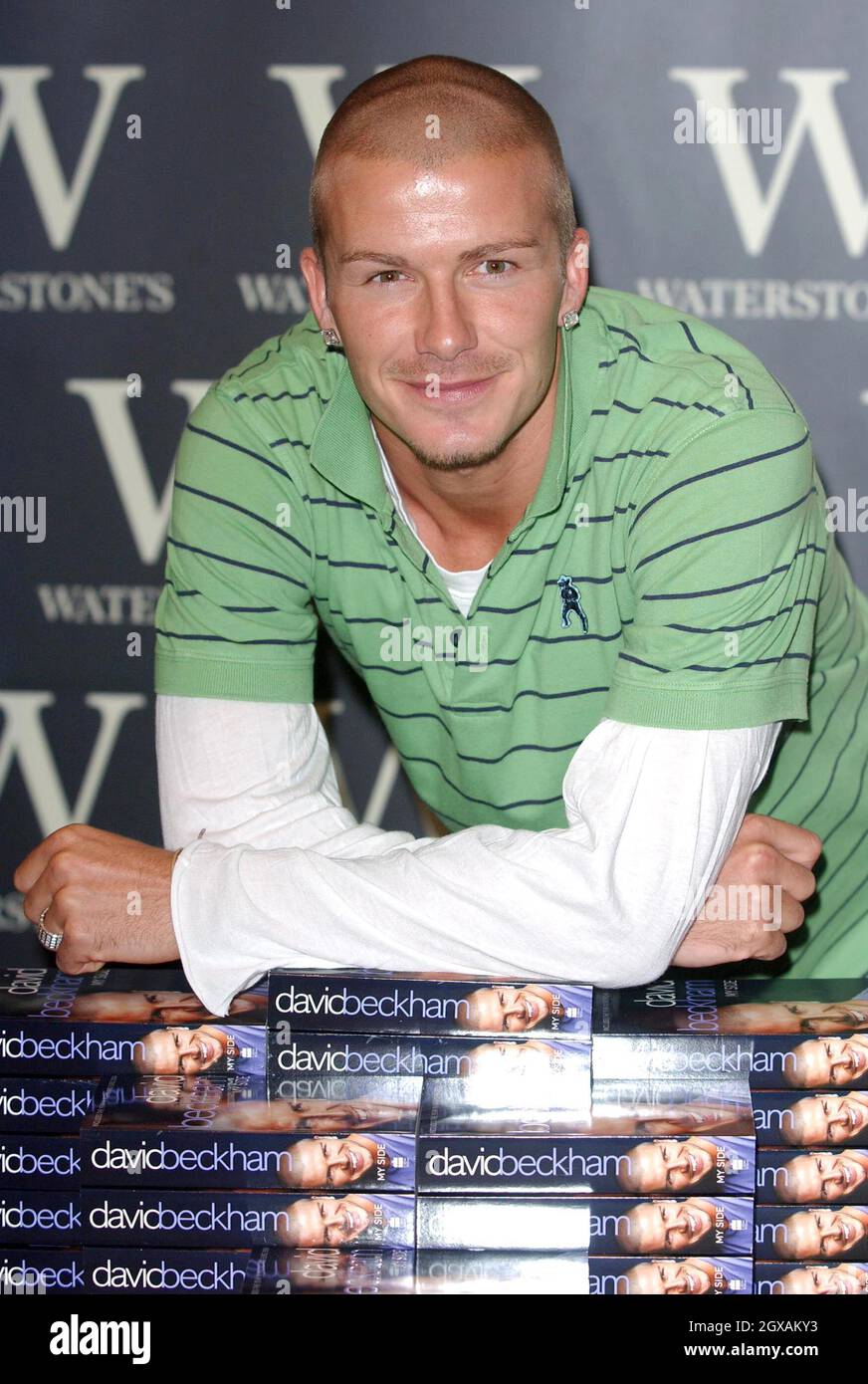 David Beckham singing cpies of his latest autobiography My Side at ...