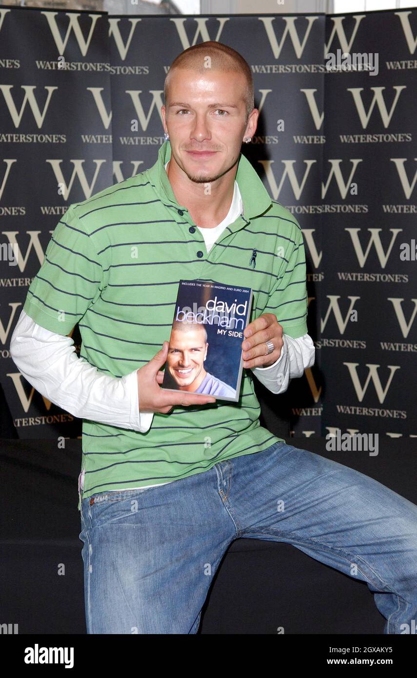 David Beckham singing cpies of his latest autobiography My Side at ...