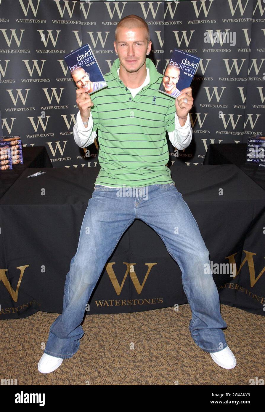 David Beckham singing cpies of his latest autobiography My Side at ...