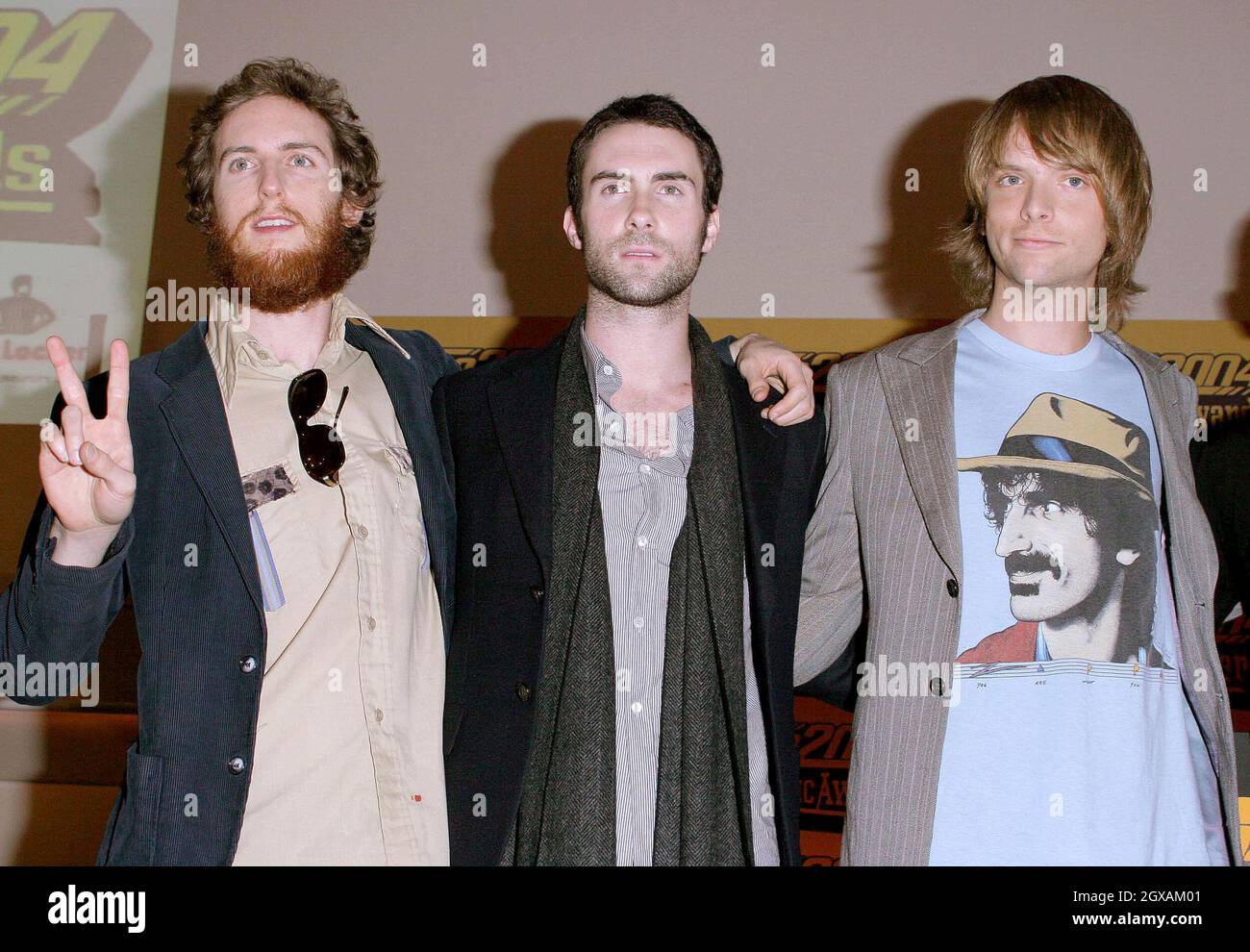 Maroon 5 's singer Adam Levine with his two band mates at the MTV ...