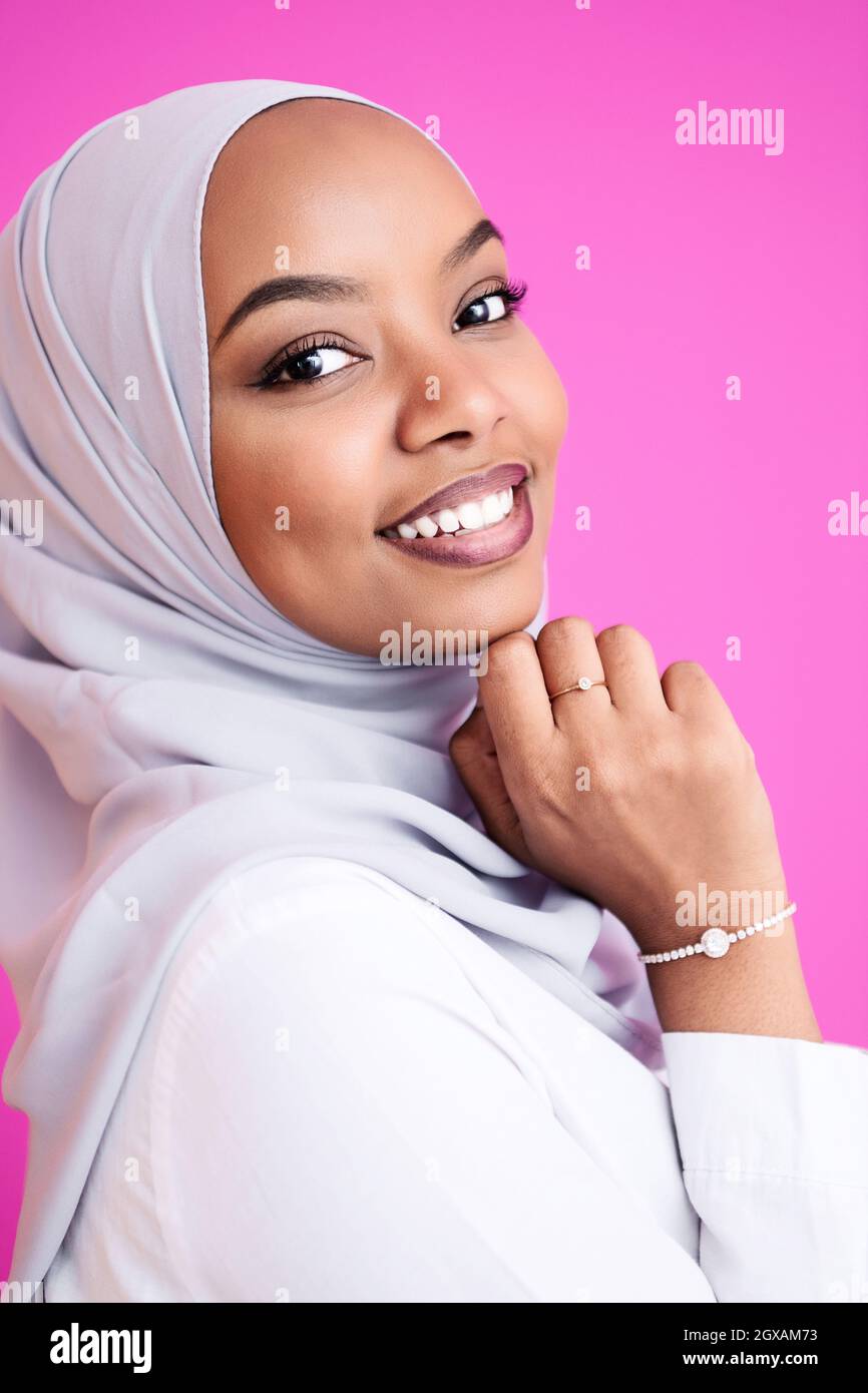 portrait of young modern muslim afro beauty wearing traditional islamic ...