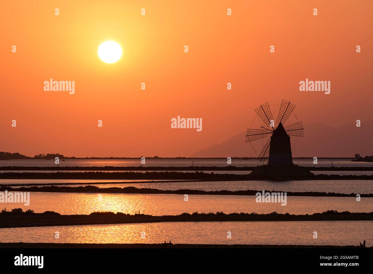 Sunset at Saltworks in Marsala Stock Photo - Alamy