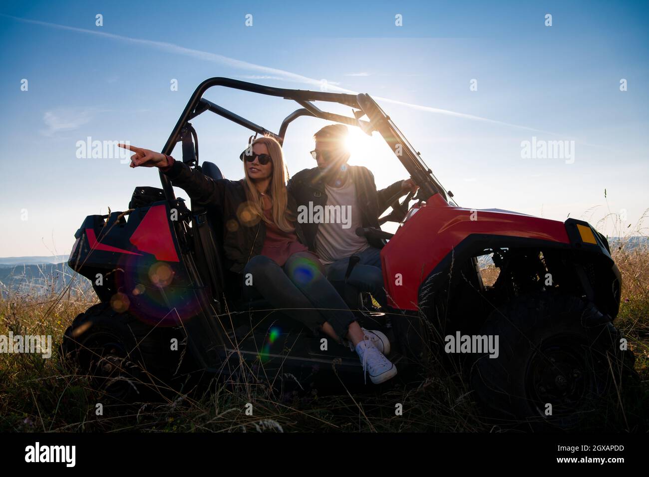 portrait of young happy excited couple enjoying beautiful sunny day ...