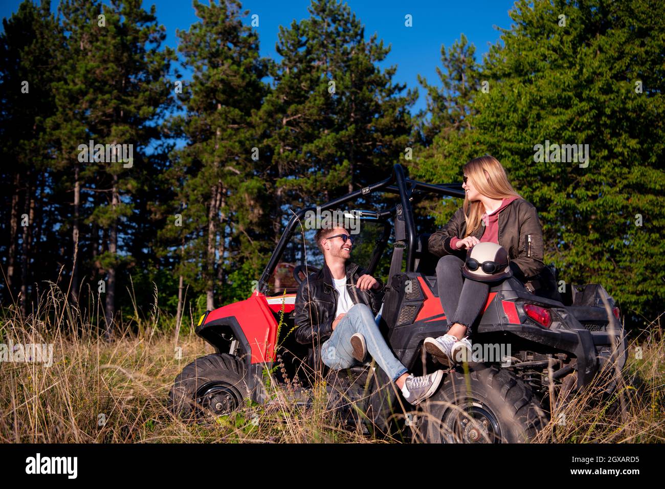 portrait of young happy excited couple enjoying beautiful sunny day ...