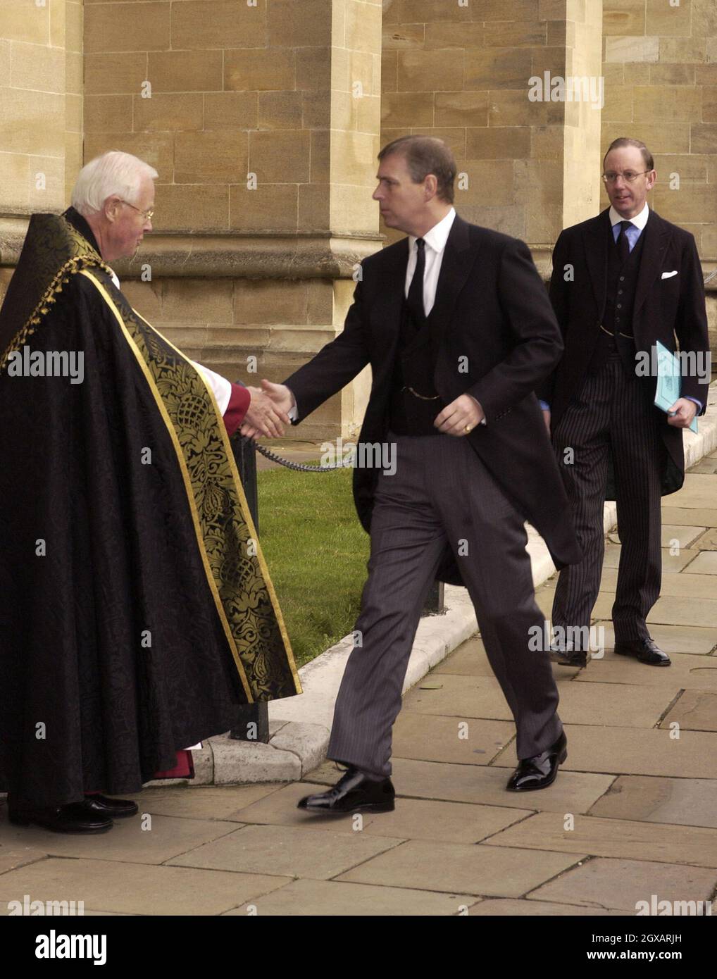 Prince Andrew is greeted at the funeral of Princess Alice at St ...