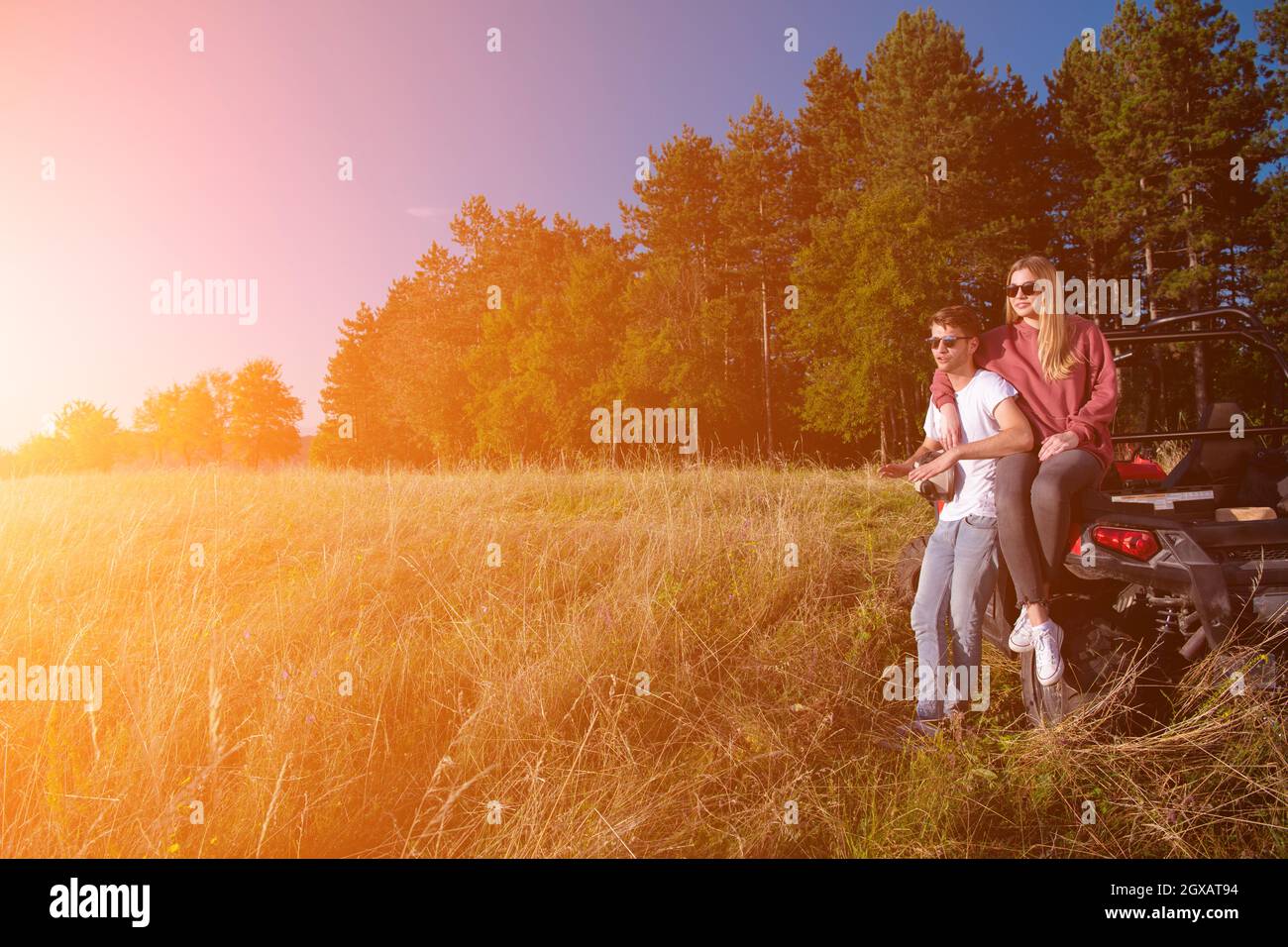 portrait of young happy excited couple enjoying beautiful sunny day ...