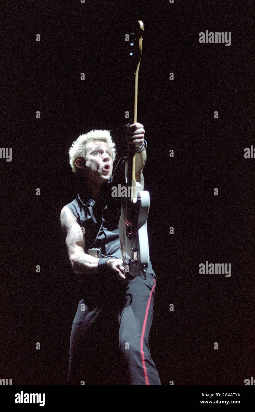 Mike Dirnt of Green Day performs at the Pacific Coliseum in Vancouver ...