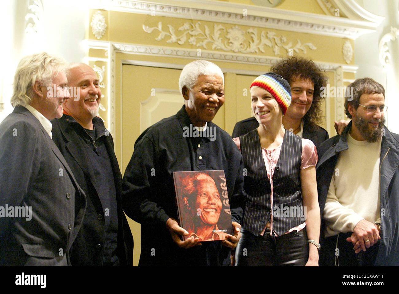 Nelson Mandela with Annie Lennox and Brian May at Nelson Mandela's book ...
