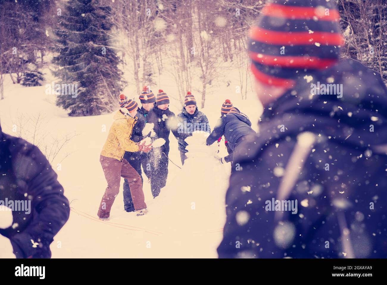 group of young happy business people having a competition in making ...