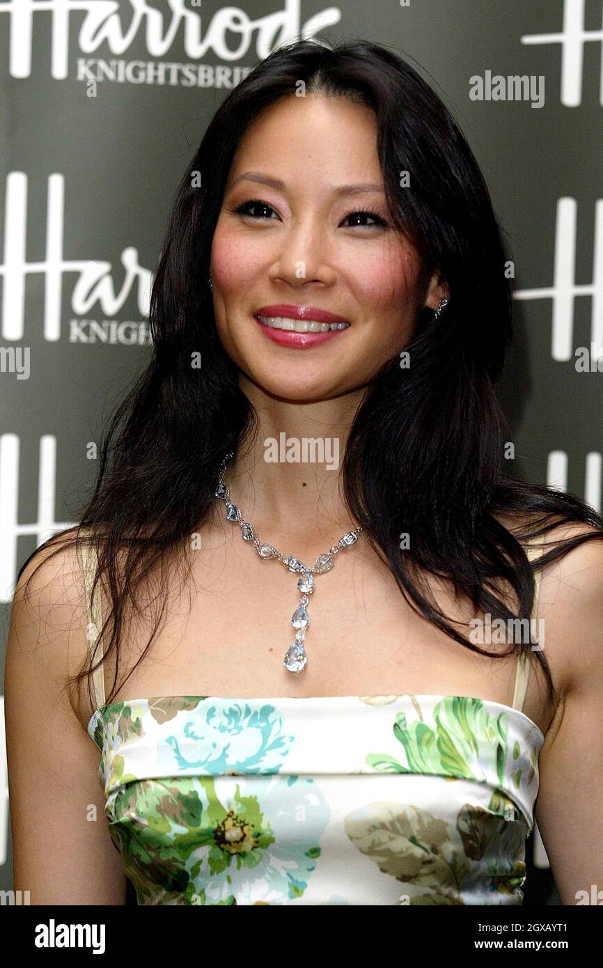 American actress Lucy Liu launching the 2005 Harrod's January Sale, in ...