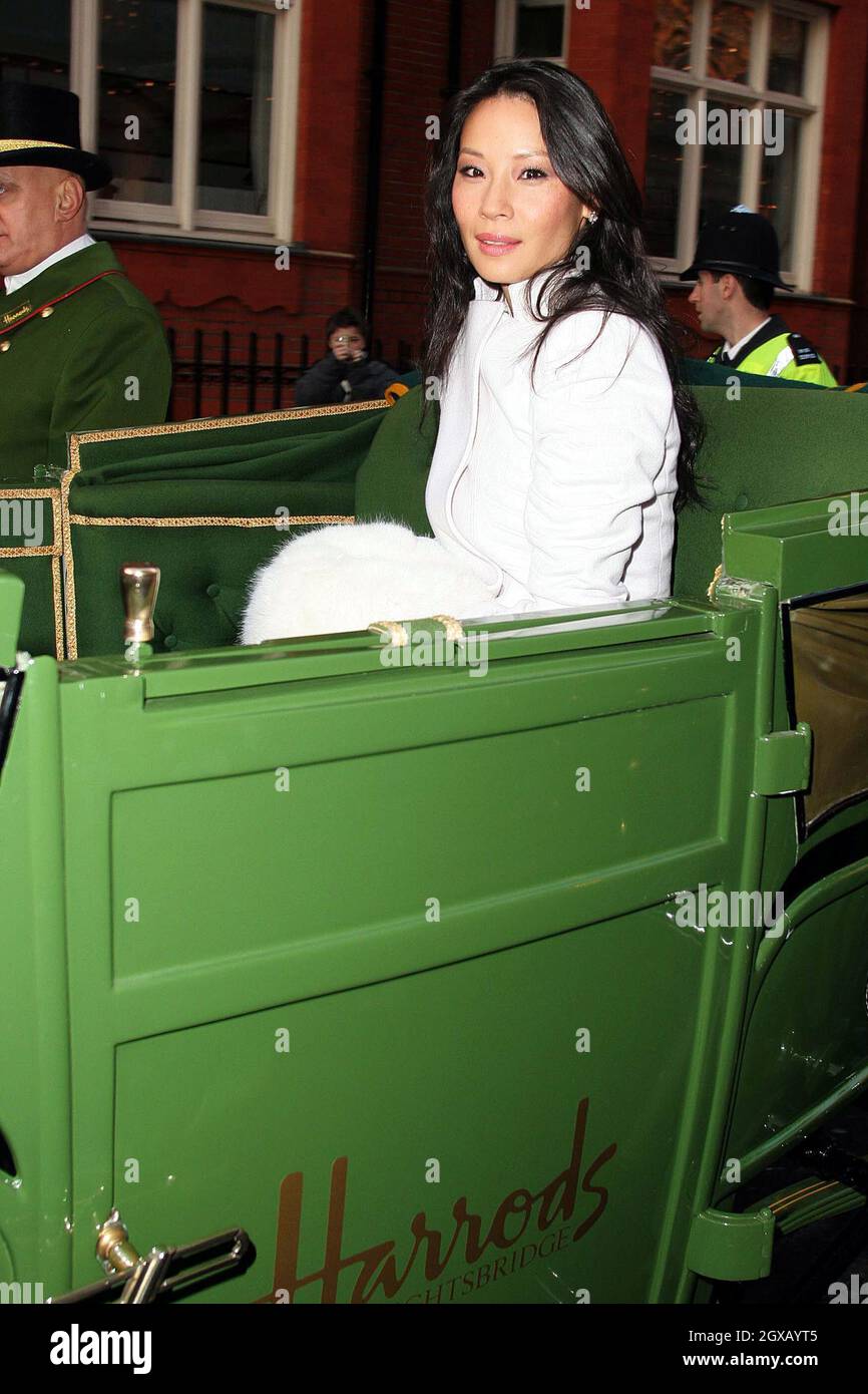 American actress Lucy Liu launching the 2005 Harrod's January Sale, in ...