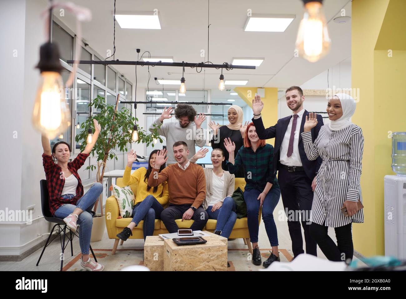 Business team portrait at modern startup office, standing together and ...