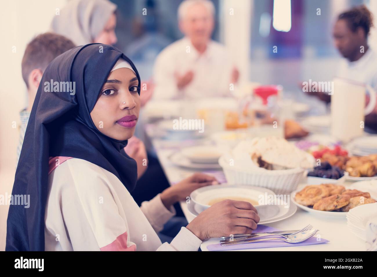 modern african american muslim woman enjoying iftar dinner together ...