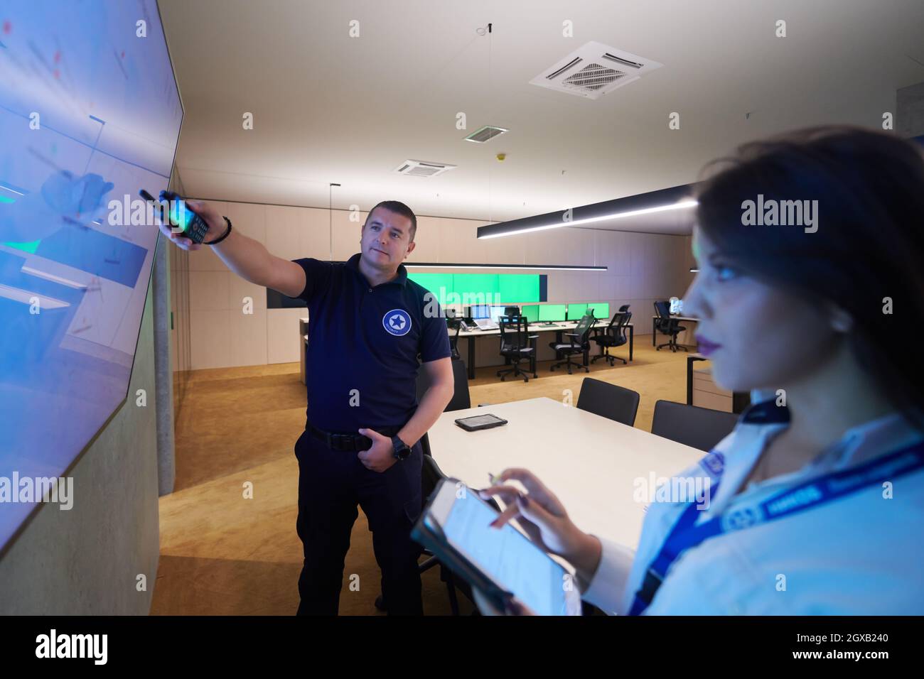 Group of Security data center operators working in a CCTV monitoring ...