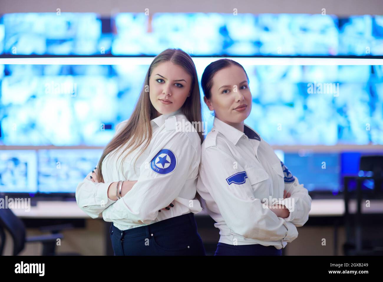 group portrait of female security operator while working in a data ...