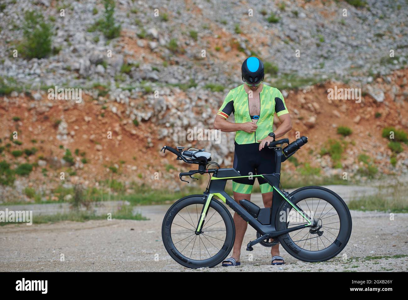 triathlon athlete riding professional racing bike at workout on curvy country road Stock Photo ...