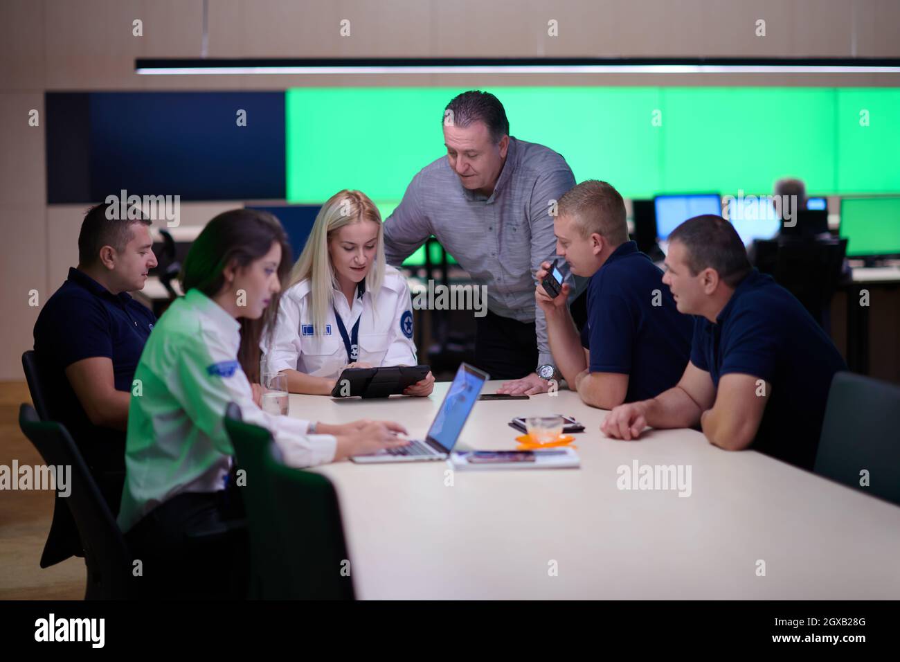 Man surrounded by screens hi-res stock photography and images - Alamy