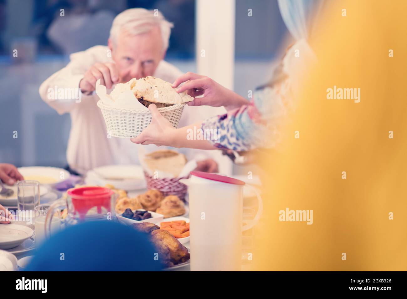 modern multiethnic muslim family enjoying eating iftar dinner together ...