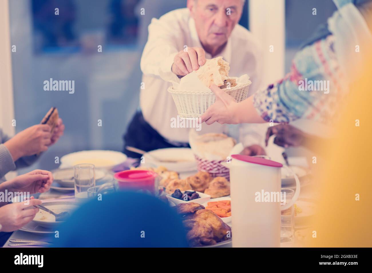 modern multiethnic muslim family enjoying eating iftar dinner together ...