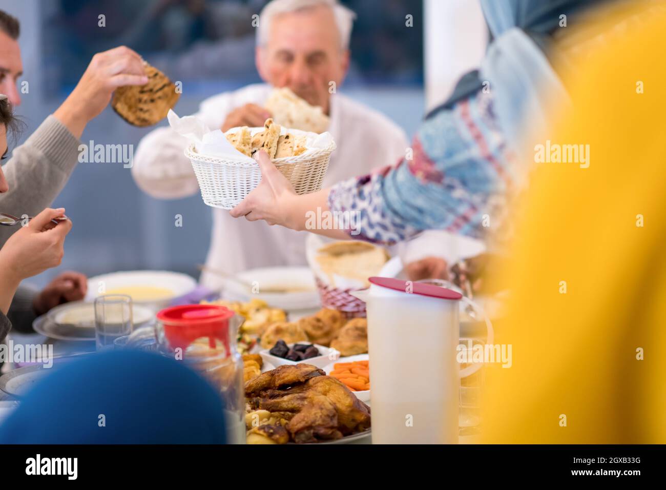 modern multiethnic muslim family enjoying eating iftar dinner together ...