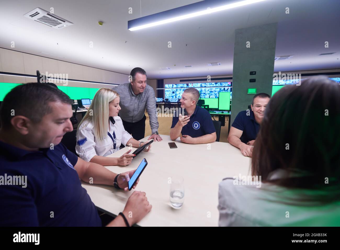Man surrounded by screens hi-res stock photography and images - Alamy