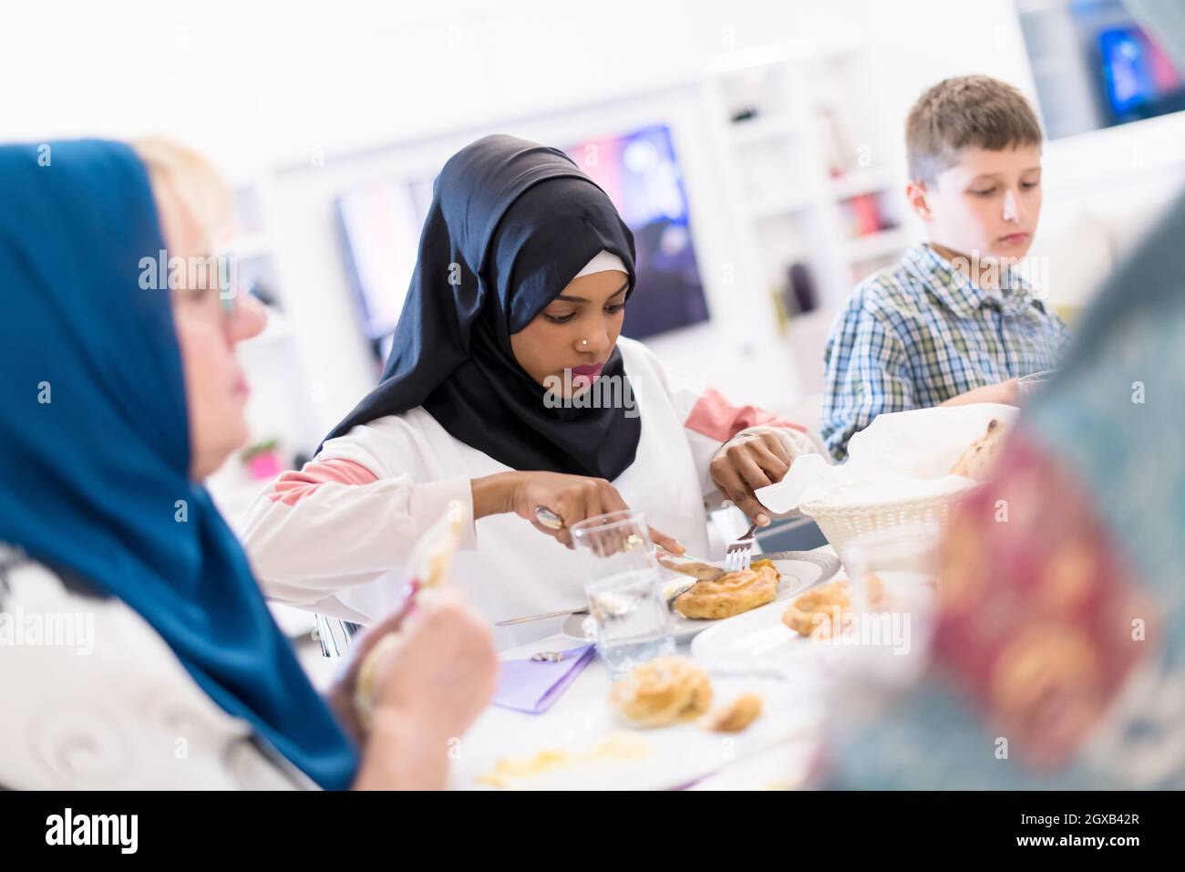 modern african american muslim woman enjoying iftar dinner together ...