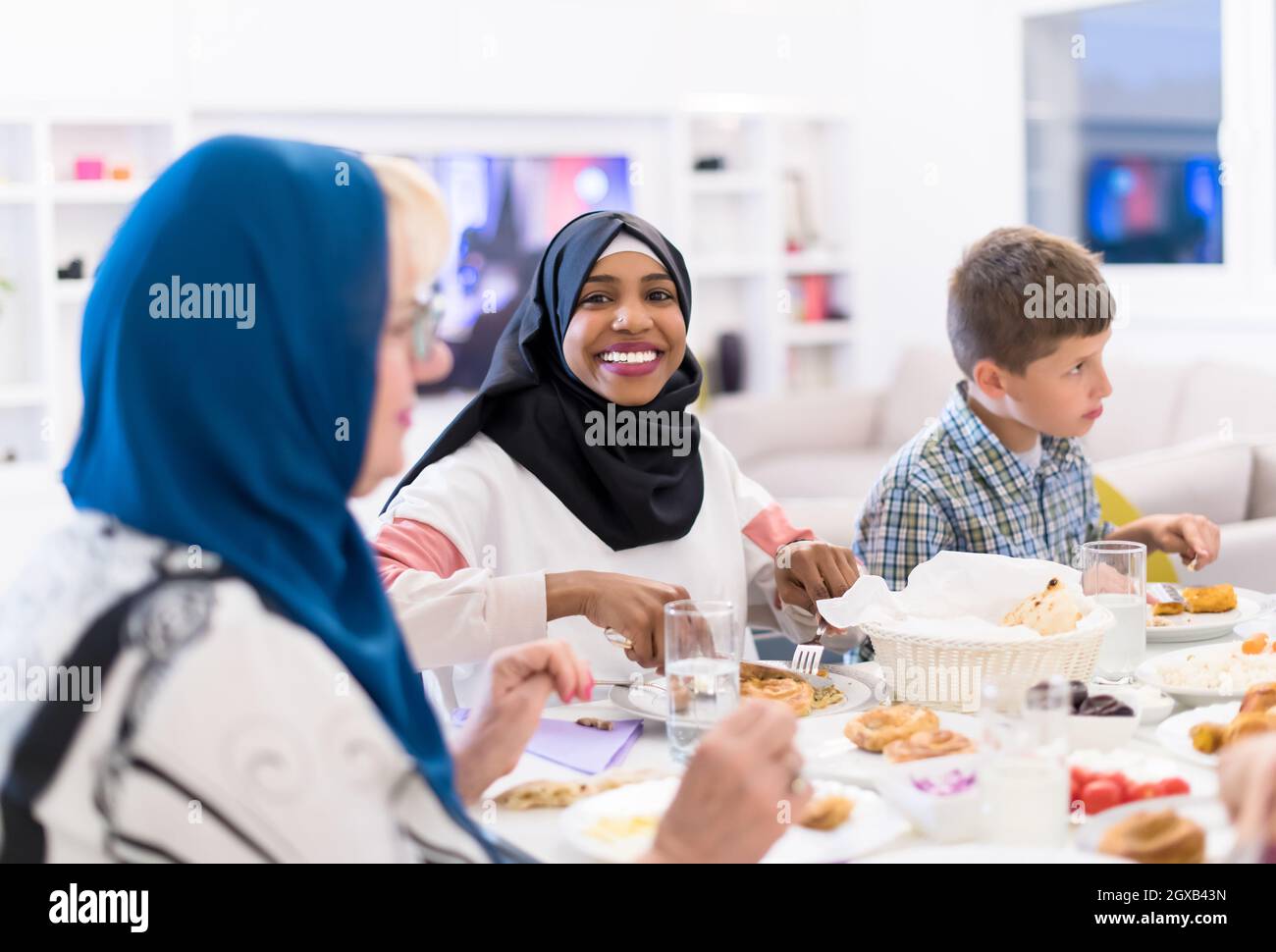 modern african american muslim woman enjoying iftar dinner together ...