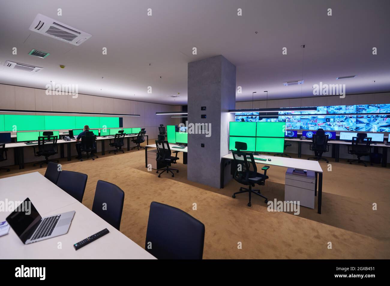 Group of Security data center operators working in a CCTV monitoring ...