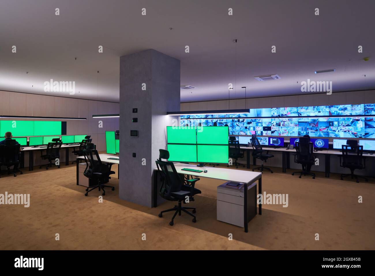 Group of Security data center operators working in a CCTV monitoring ...