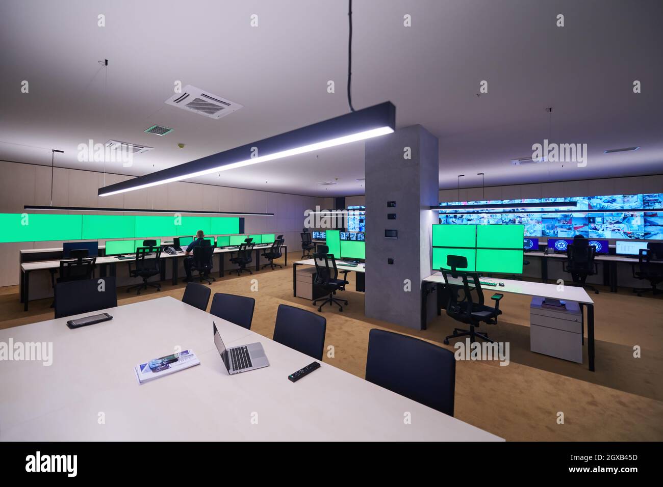 Group of Security data center operators working in a CCTV monitoring ...