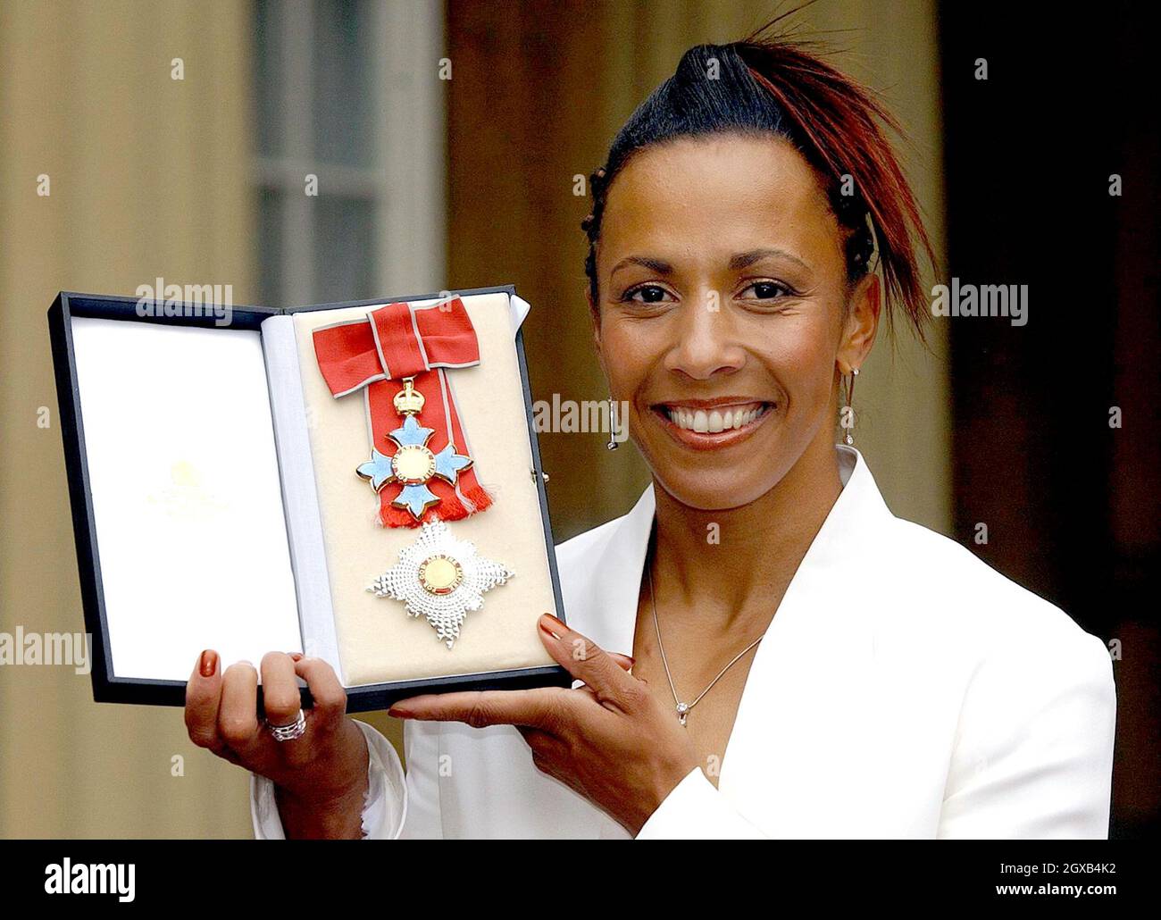 Double Olympic gold medallist Dame Kelly Holmes at Buckingham Palace ... Double Olympic gold medallist Dame Kelly Holmes at Buckingham Palace ...