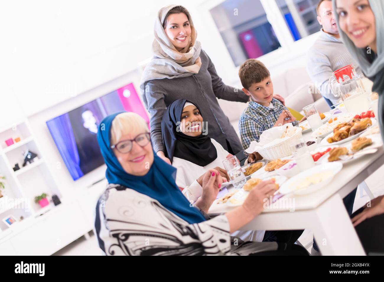 modern african american muslim woman enjoying iftar dinner together ...