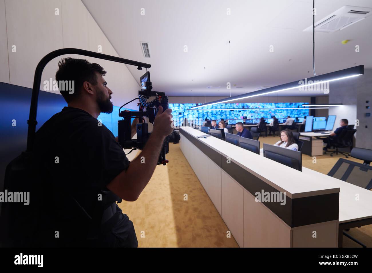 Operators working in control room hi-res stock photography and images ...