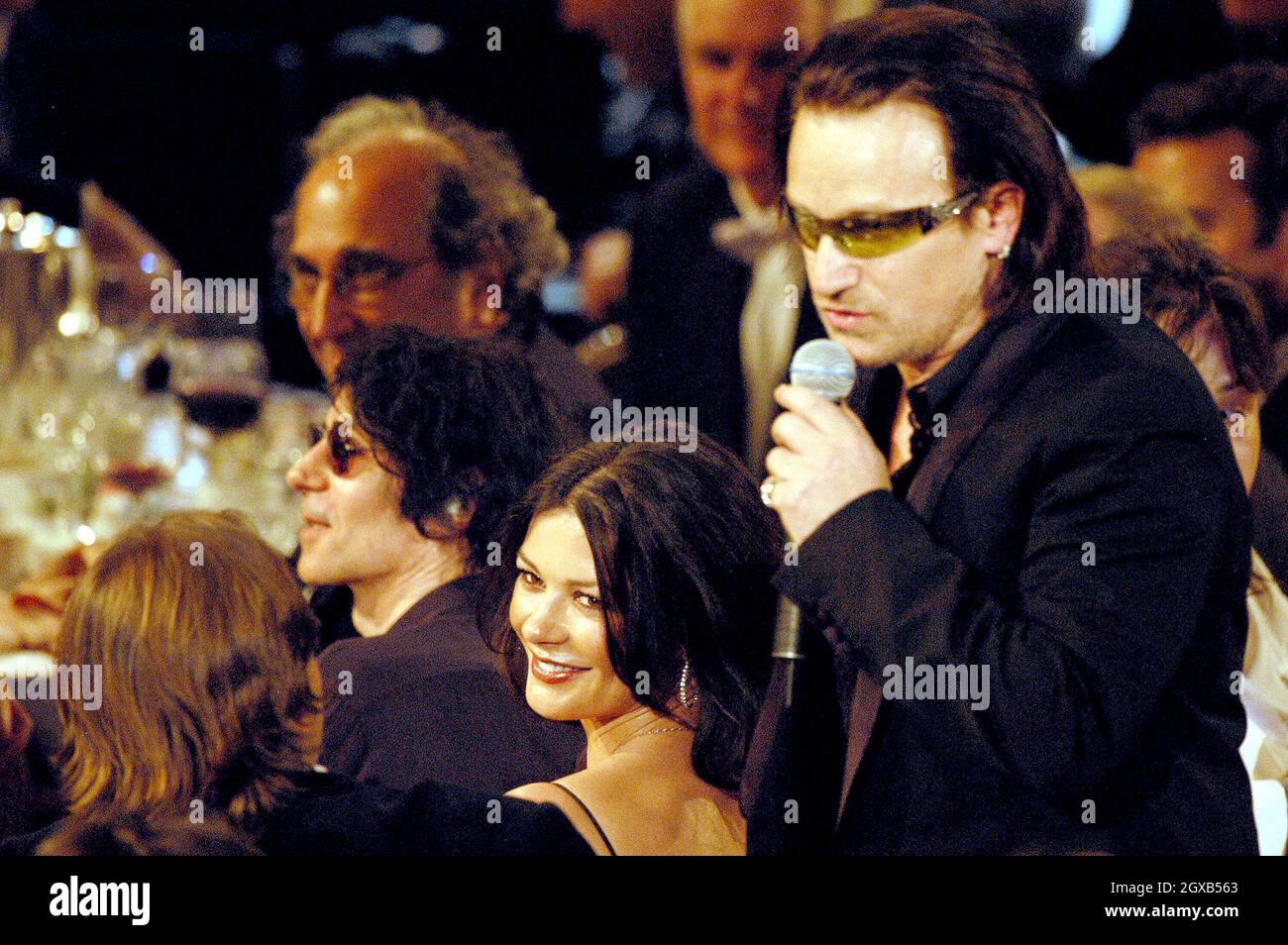 Bono from U2 with Catherine Zeta Jones attending the 20th Annual Rock ...