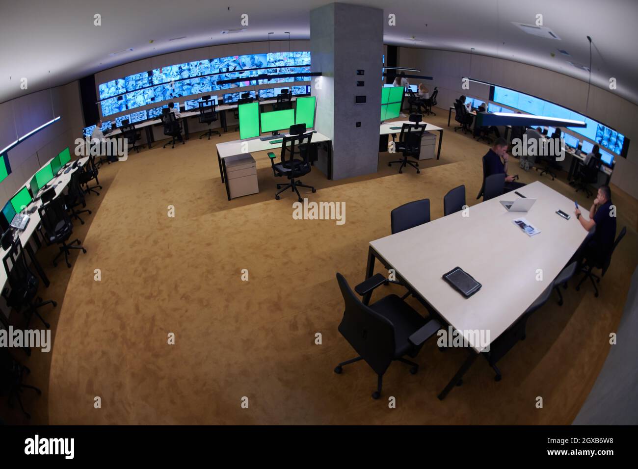 Group of Security data center operators working in a CCTV monitoring ...