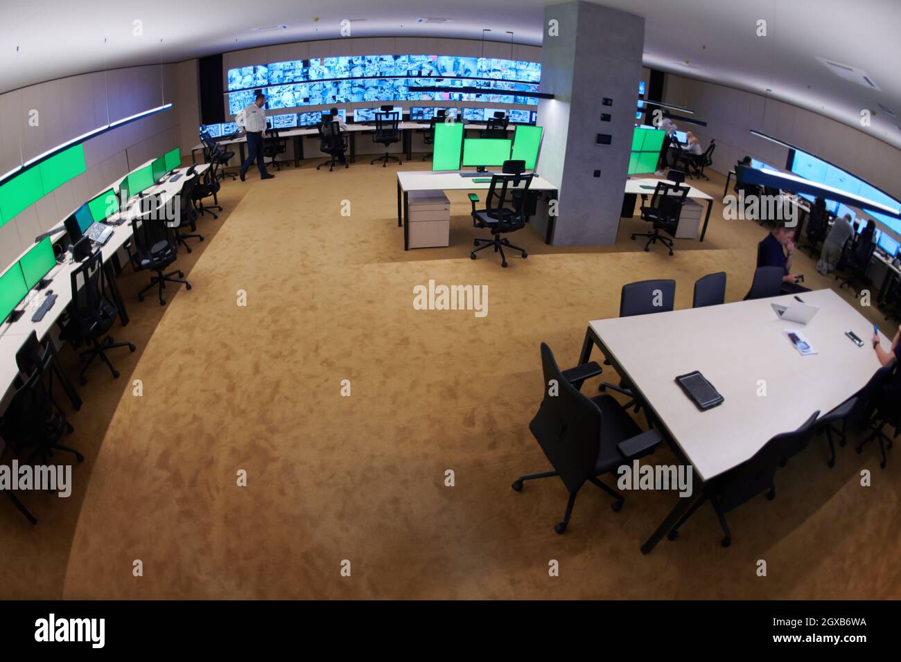 Group Of Security Data Center Operators Working In A Cctv Monitoring